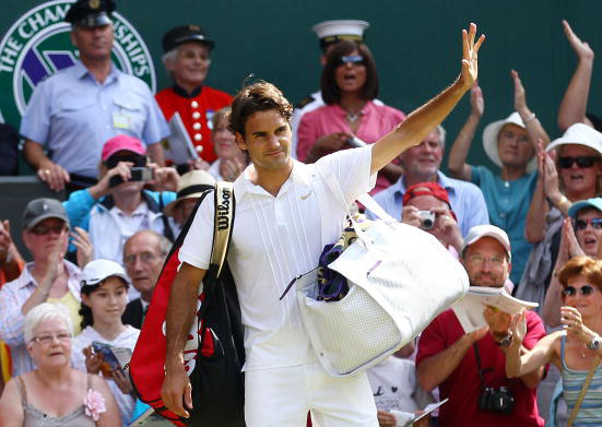 Roger Federer waves goodbye to his loving crowd at what is his ...